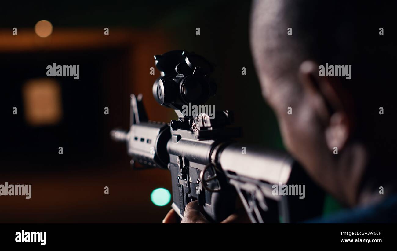 Shooting gallery client hitting paper targets with ammo, extreme close ...