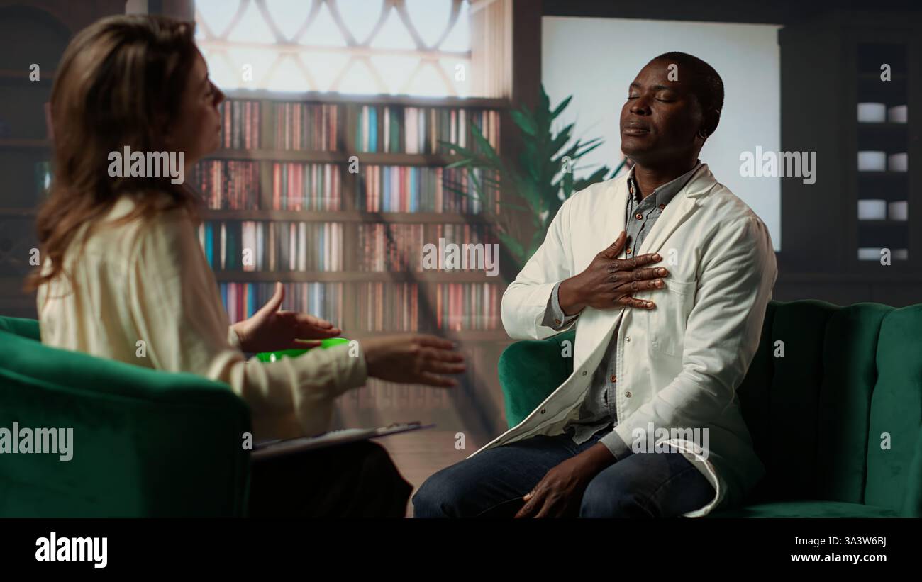 Psychiatrist in a serious conversation with a medic practitioner ...