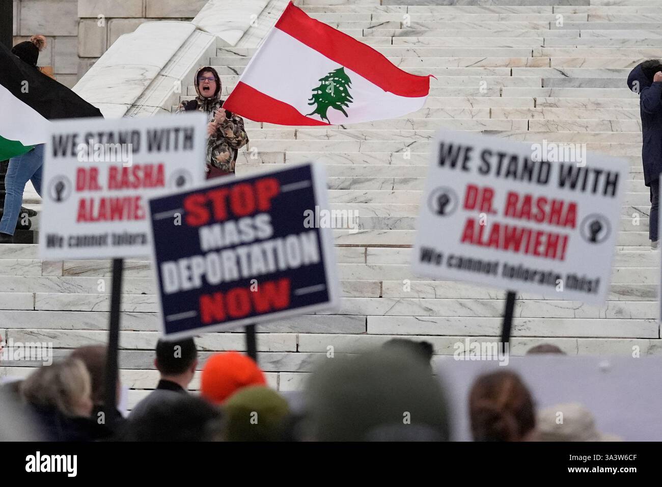 Protesters rally outside the Rhode Island State House in support of ...