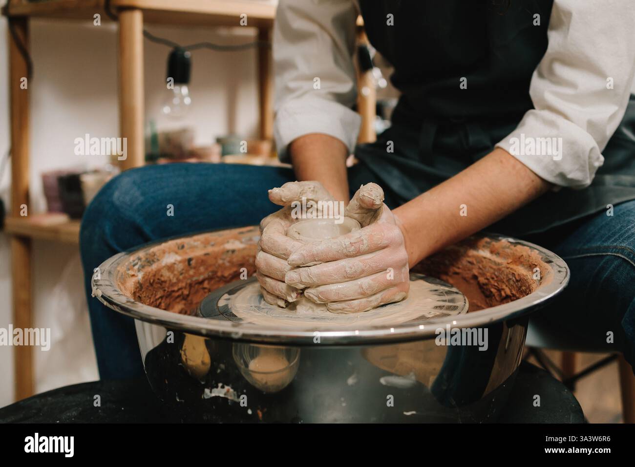 Process of making ceramic earthenware on the spinning wheel in the ...
