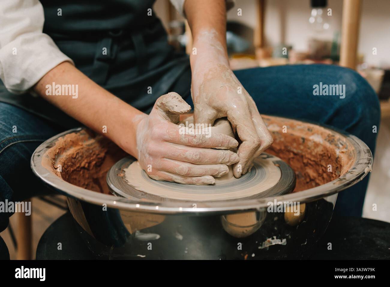 Process of making ceramic earthenware on the spinning wheel in the ...