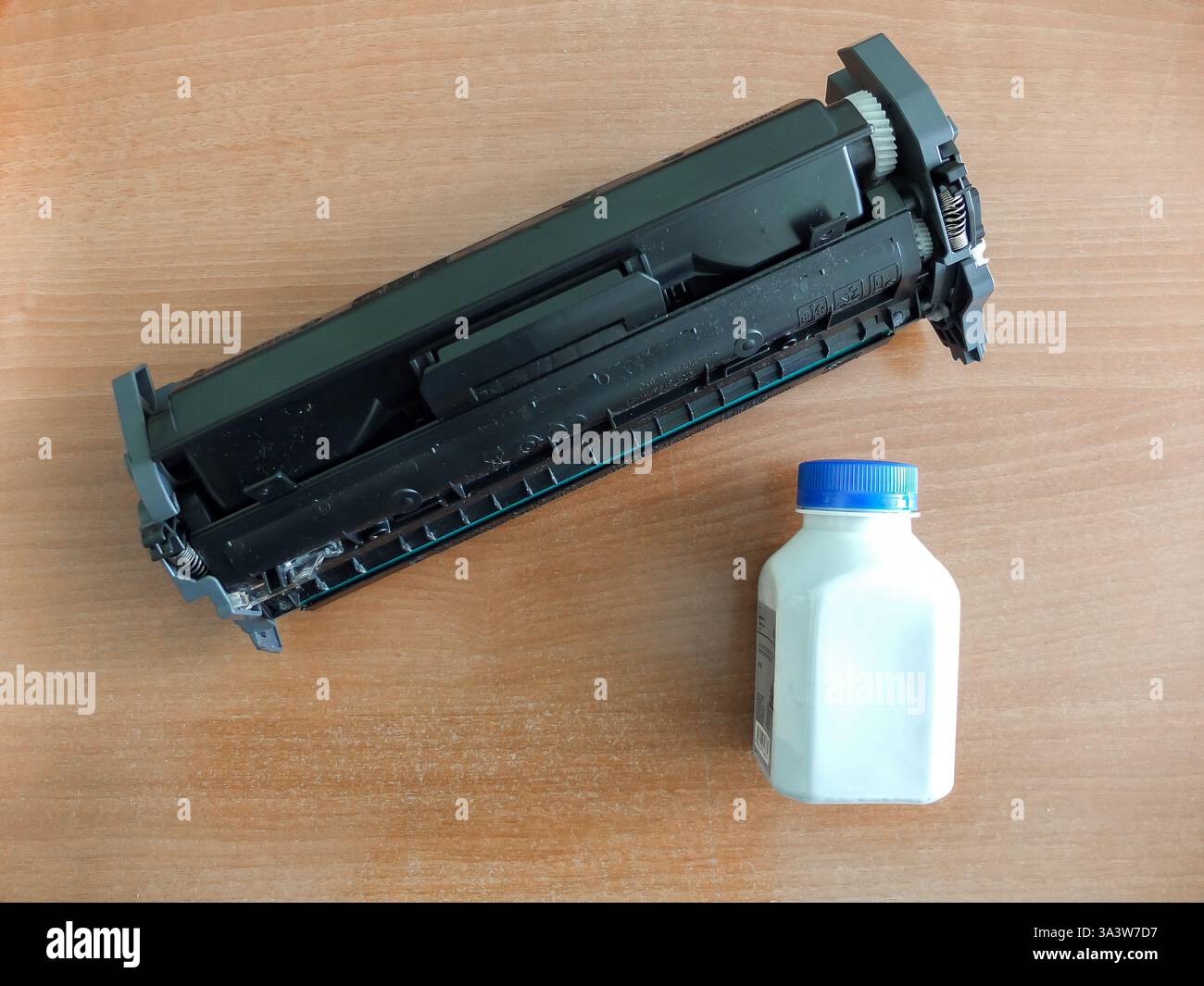 Refilling the laser printer toner cartridge Stock Photo - Alamy