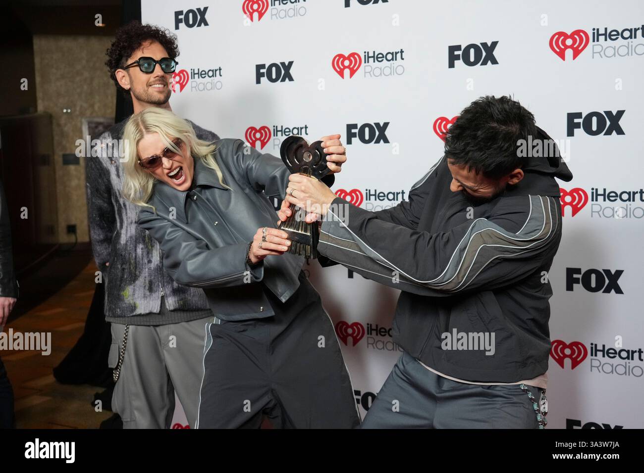 Colin Brittain, from left, Emily Armstrong, and Mike Shinoda of Linkin ...