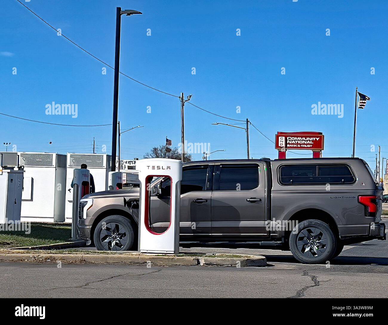 EMPORIA KANSAS, USA - MARCH 17, 2025 Ford day at the Tesla supercharger ...