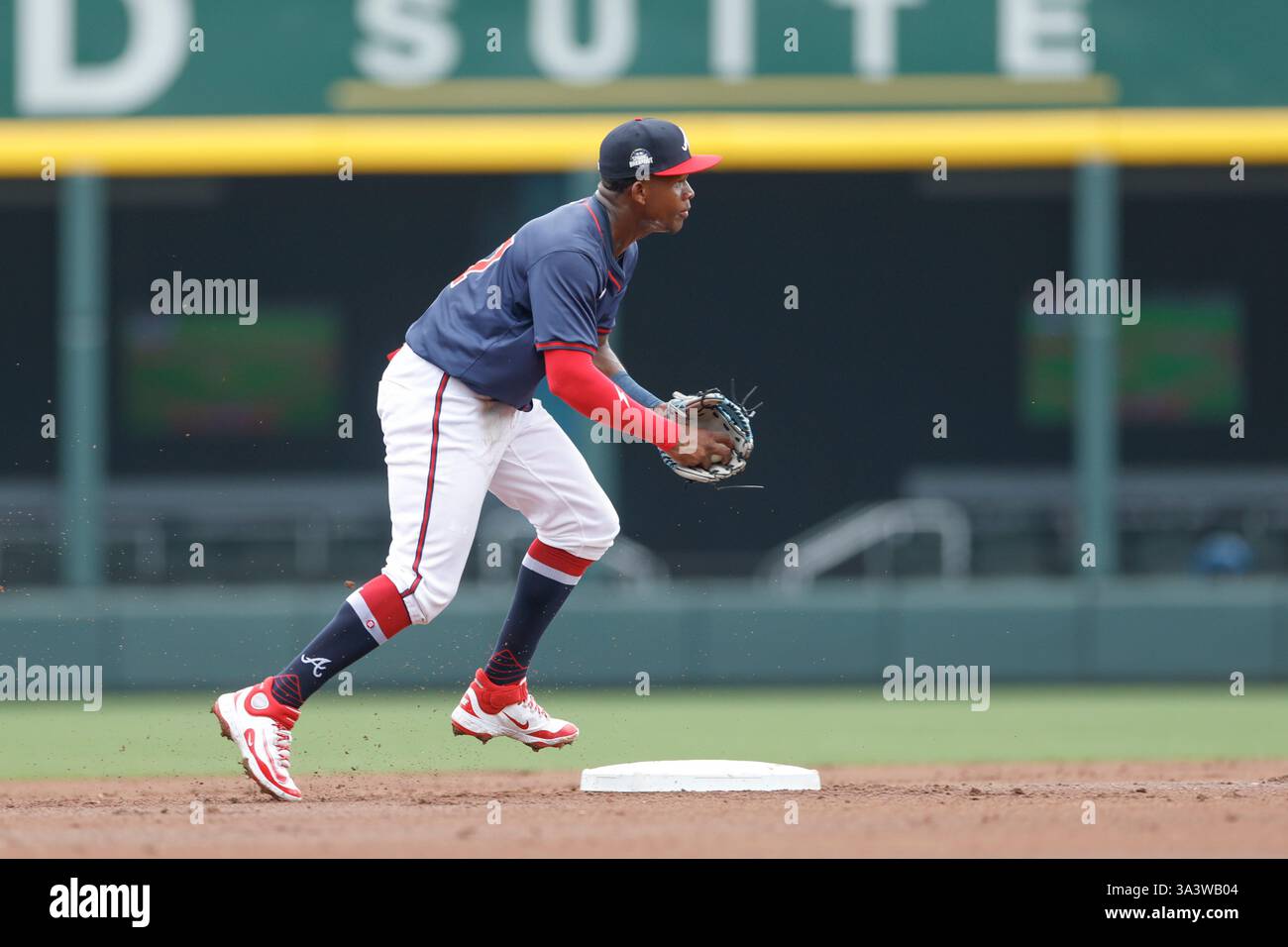 North Port FL USA; Atlanta Braves infielder John Gil (97) turns the ...