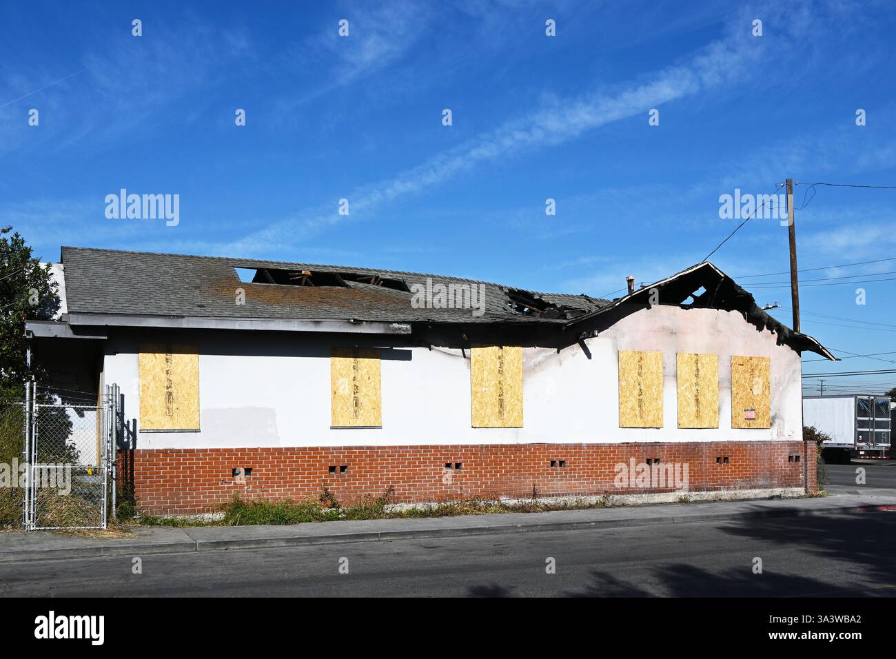 LONG BEACH, CALIFORNIA - 6 JAN 2025: Boarded up building at the old ...