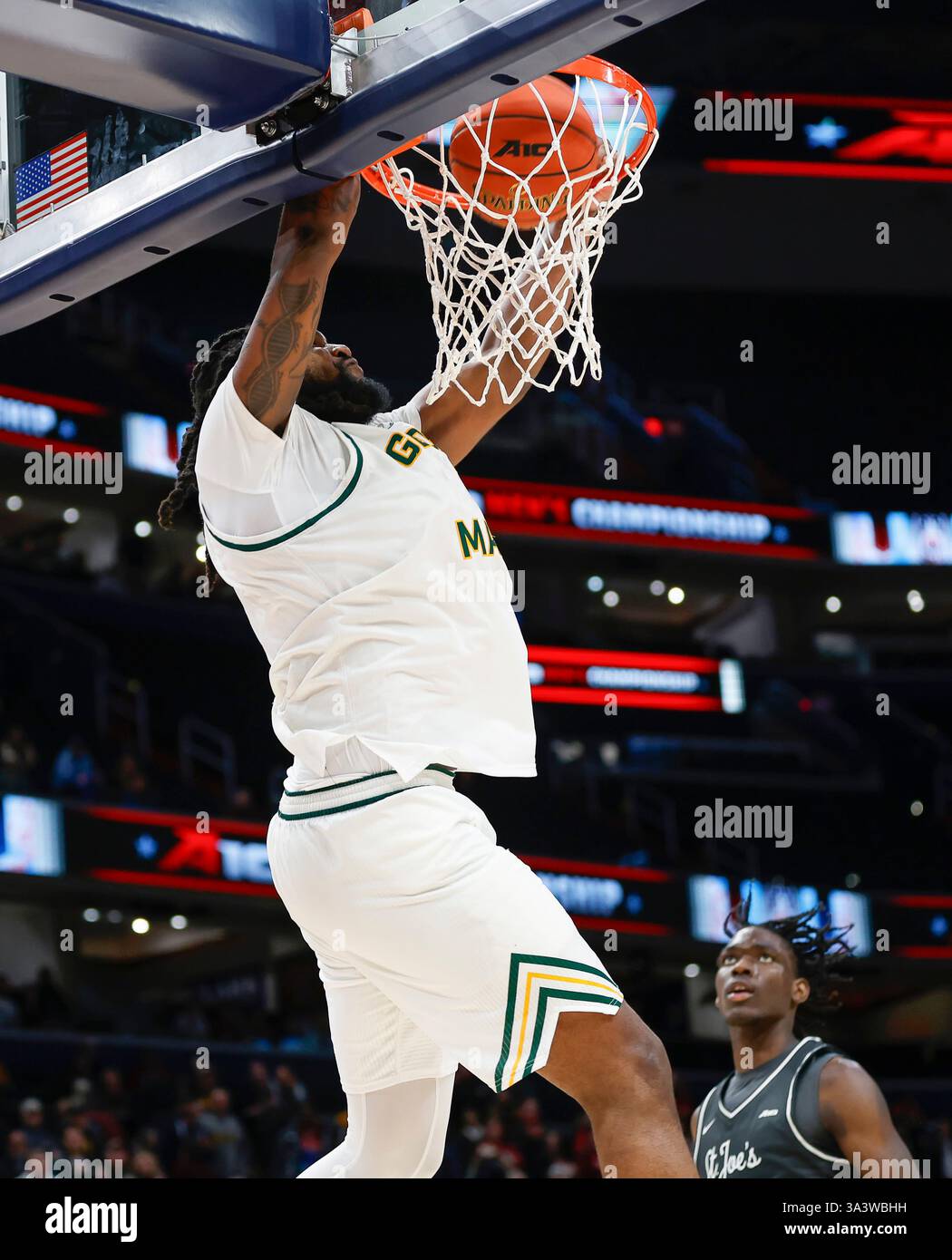 March 15, 2025: George Mason Patriots Forward (11) Jalen Haynes dunks ...