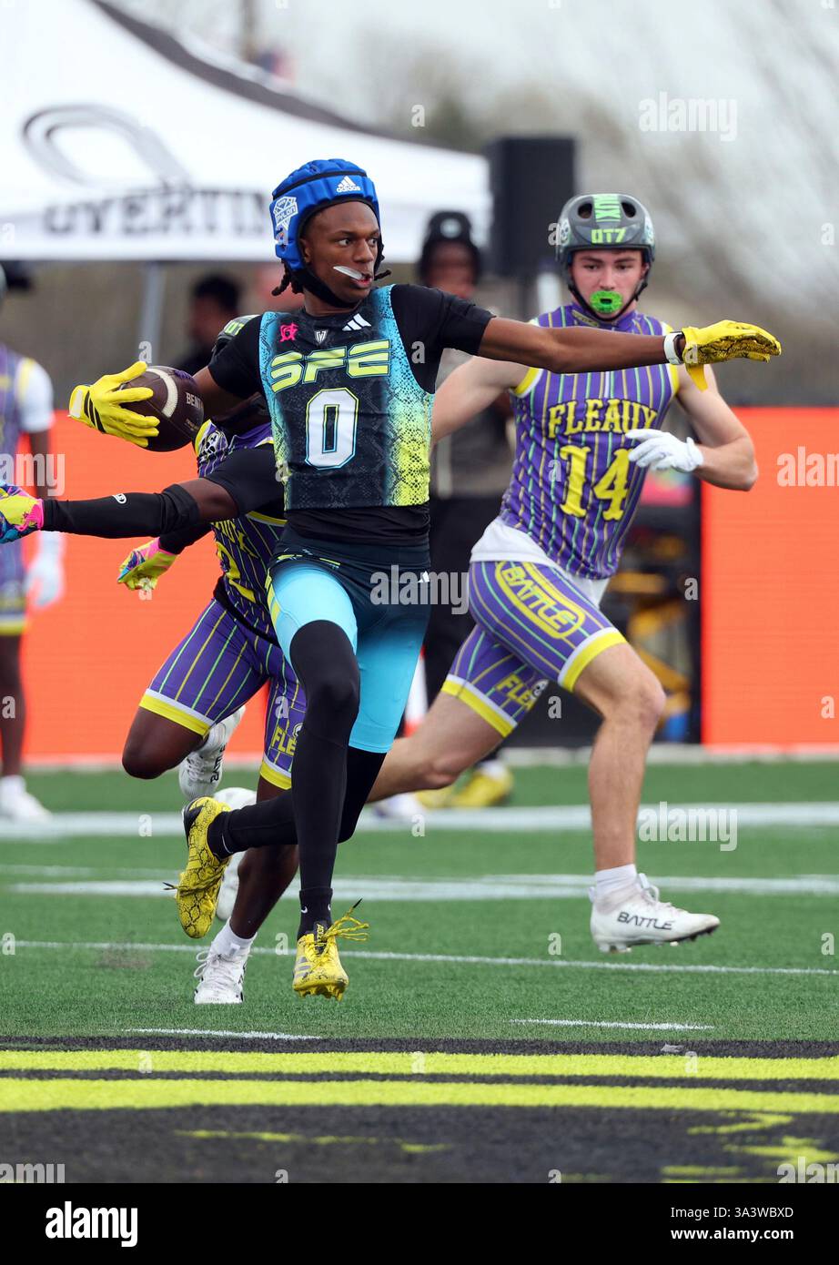 SFE cornerback Havon Finney (0) carries the ball after an interception ...