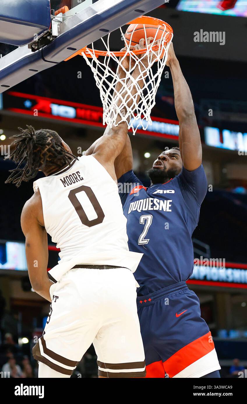 March 13, 2025: Duquesne Dukes Forward (2) David Dixon goes to the hoop ...