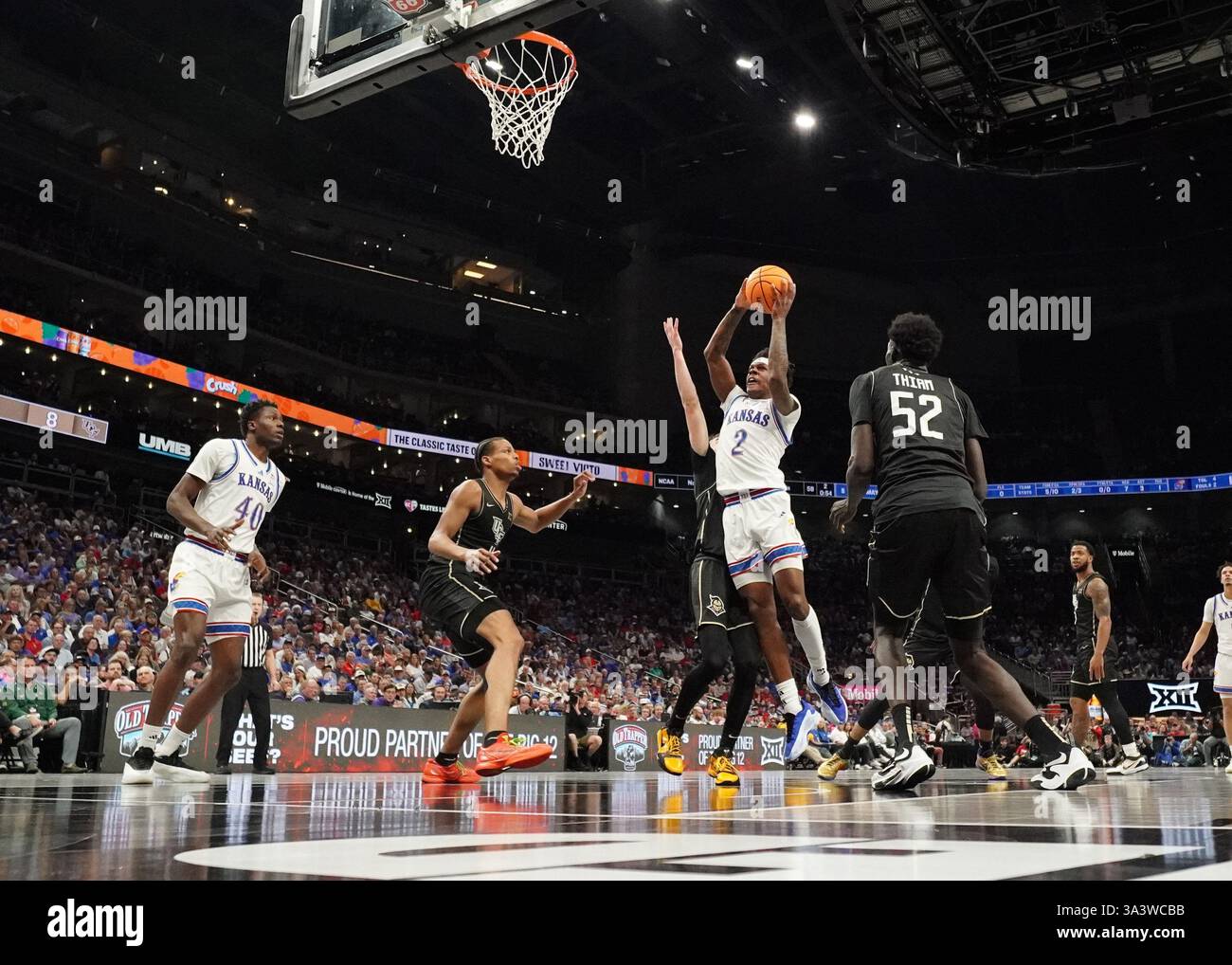 MAR 12 2025: Kansas Jayhawks guard AJ Storr (2) shoots 2 of his career ...