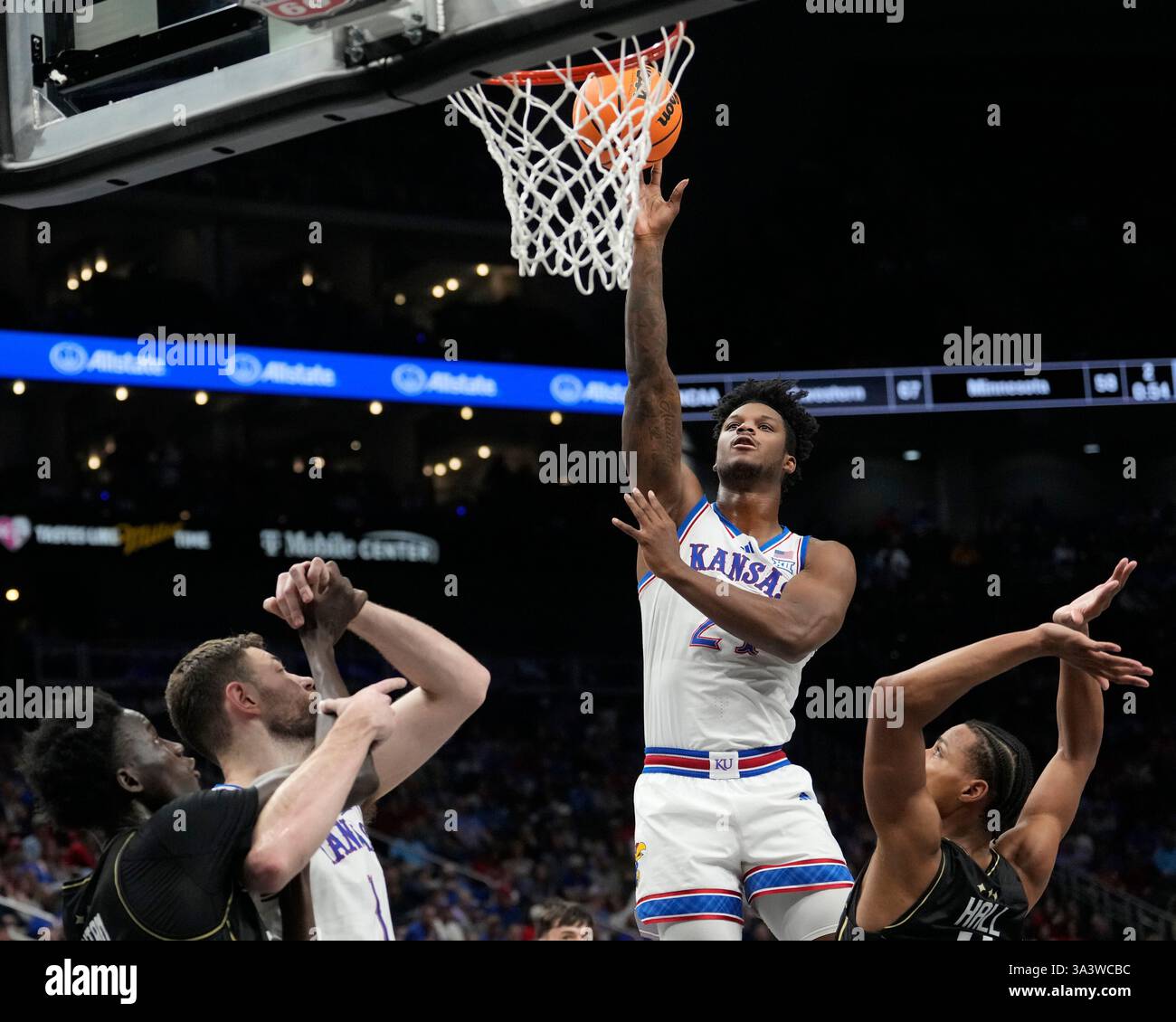 MAR 12 2025: Kansas Jayhawks forward KJ Adams Jr. (24) scores a basket ...