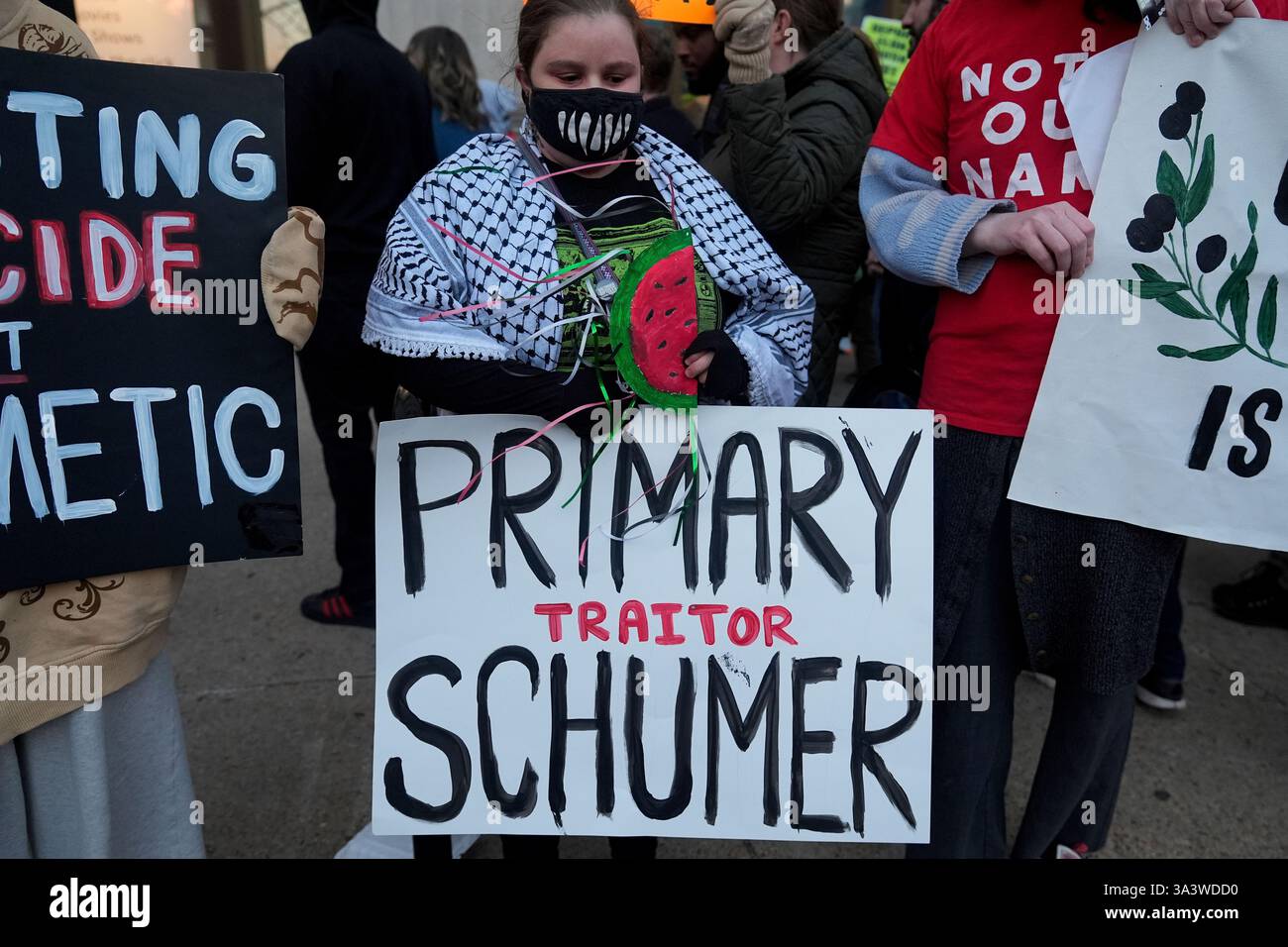 Demonstrators gather in front of the Central Library branch of the ...