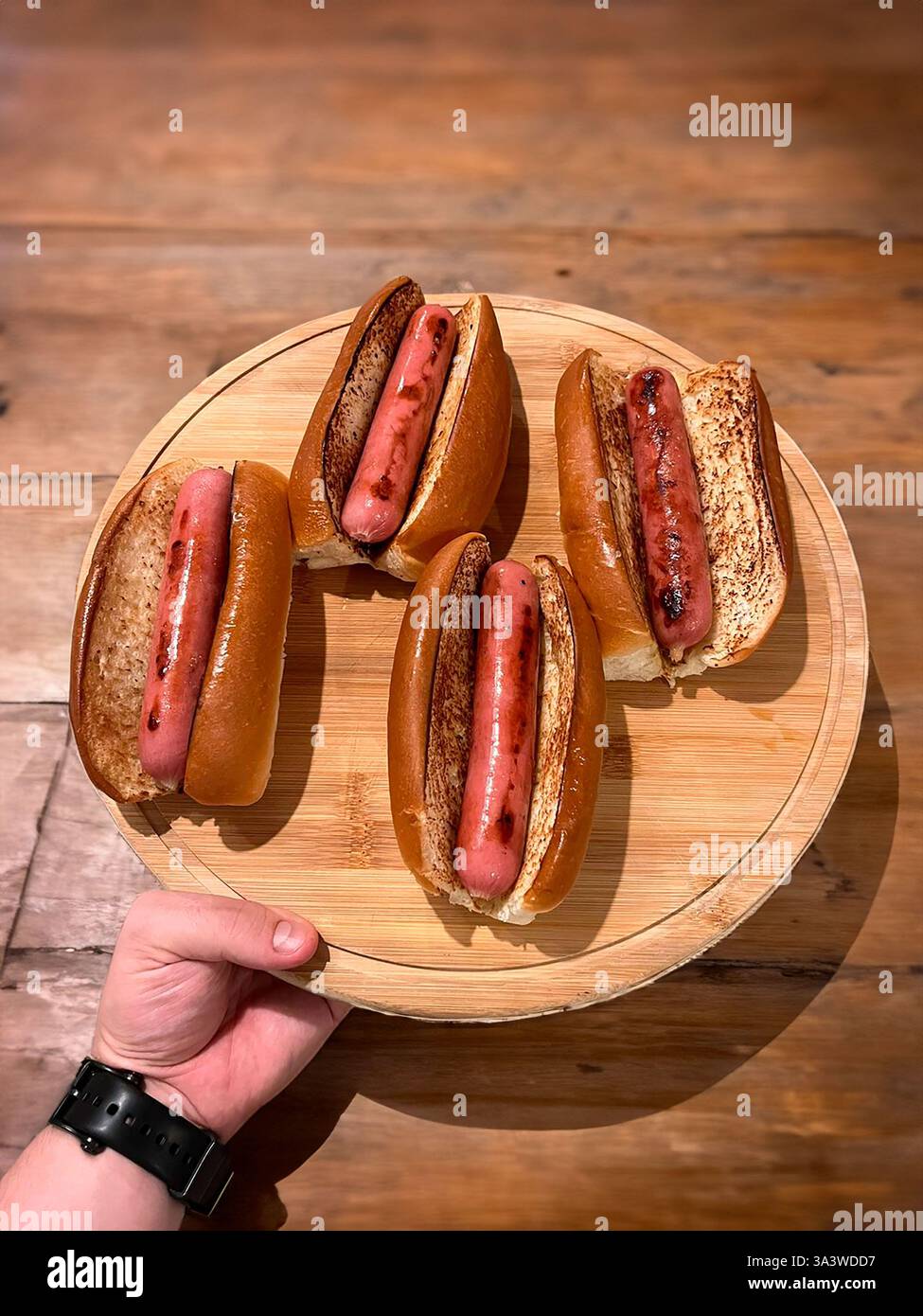 Traditional hot dog with sausage grilled on the barbecue Stock Photo ...