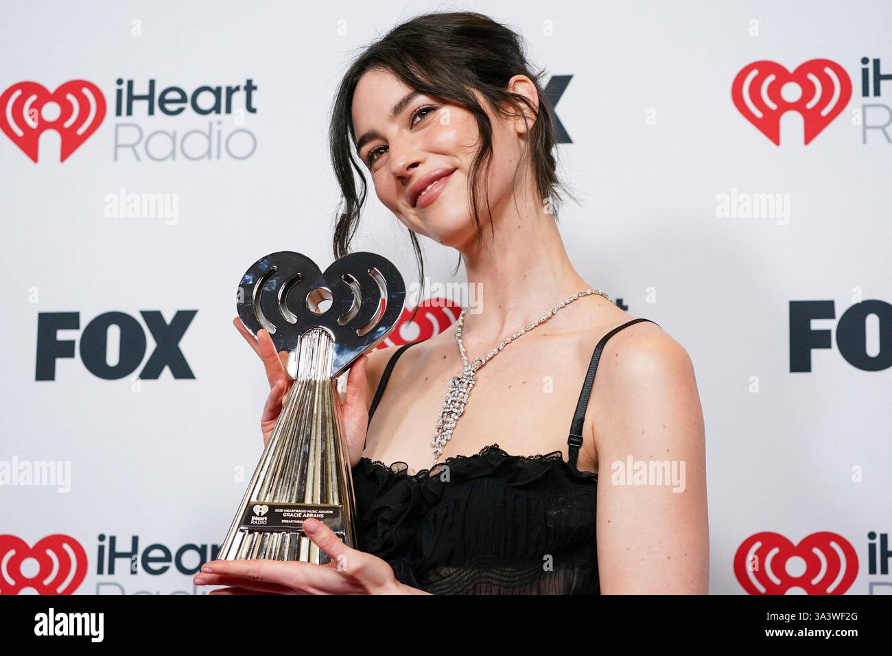 Gracie Abrams, winner of the award for breakthrough artist of the year ...