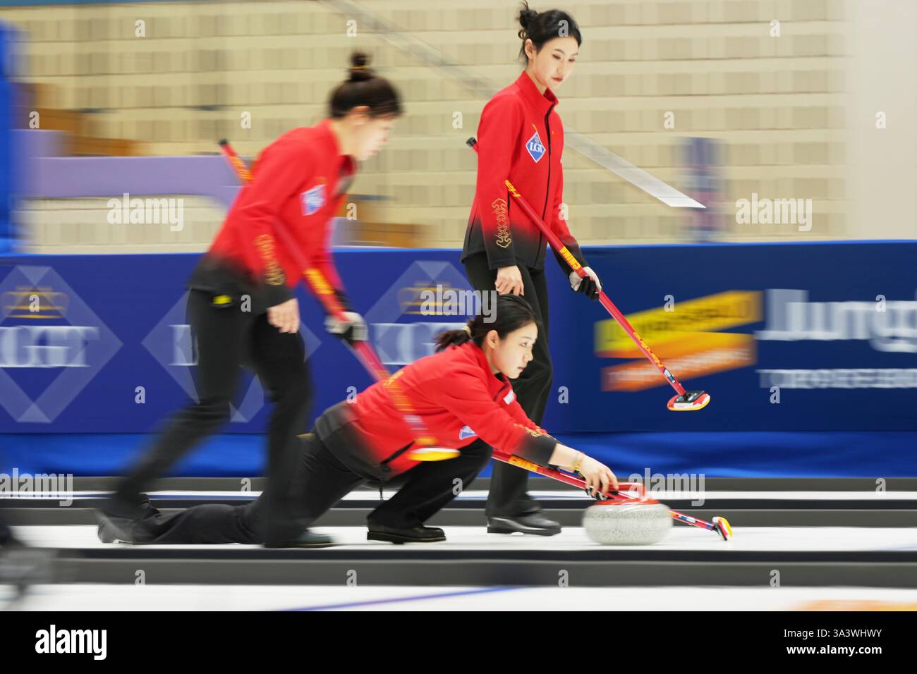 China's Han Yu releases the stone during the match against Italy at the World Women's Curling ...