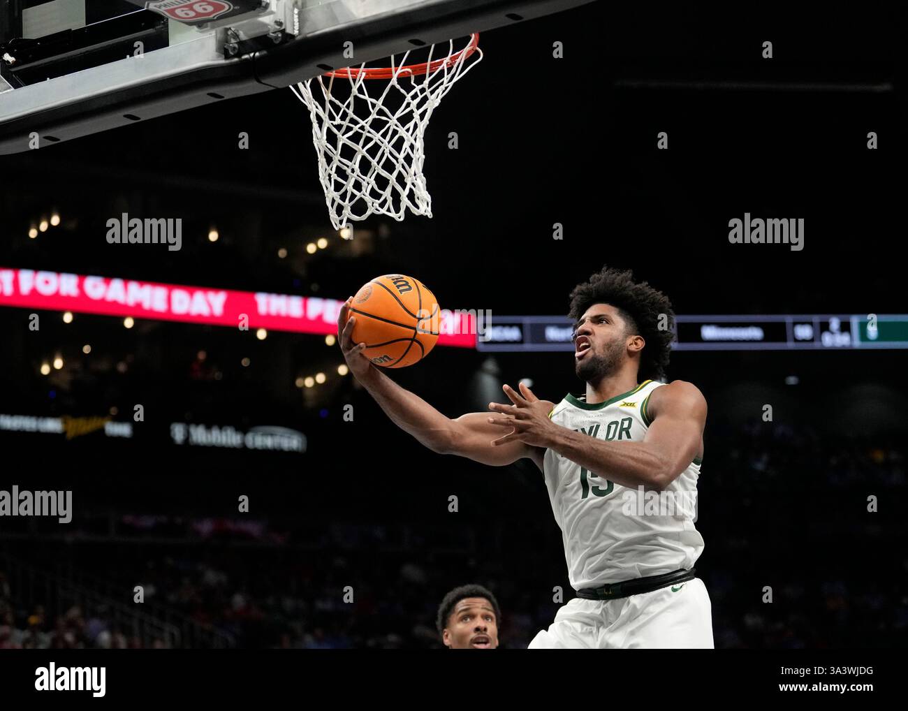 MAR 12 2025: Baylor Bears forward Norchad Omier (15) scores a layup ...