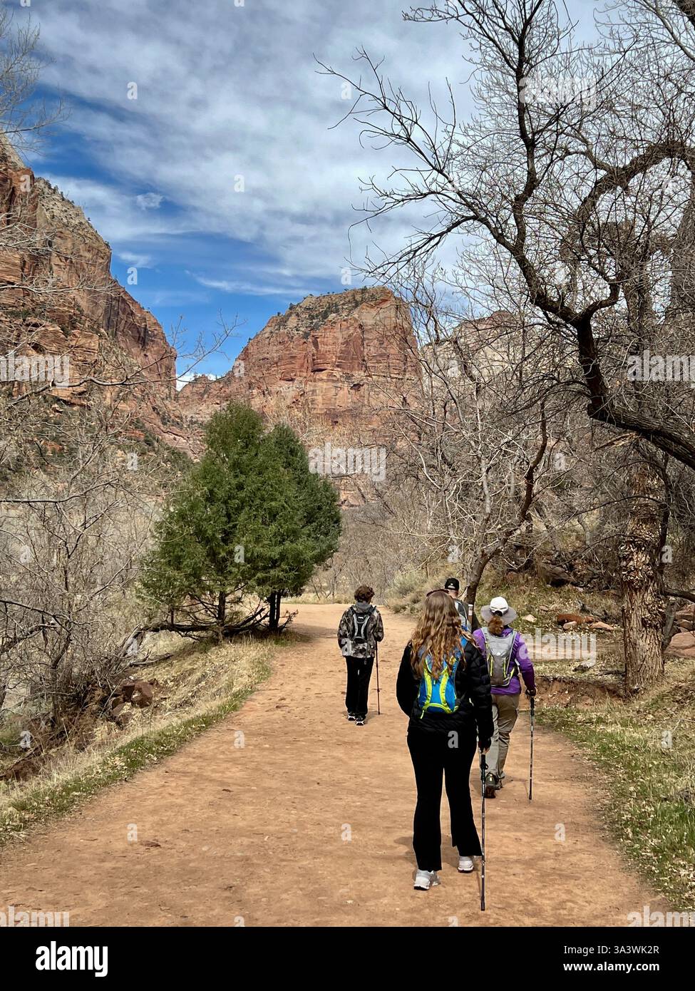 Hikers walk along Grotto Trail at Zion National Park in Utah on Monday ...