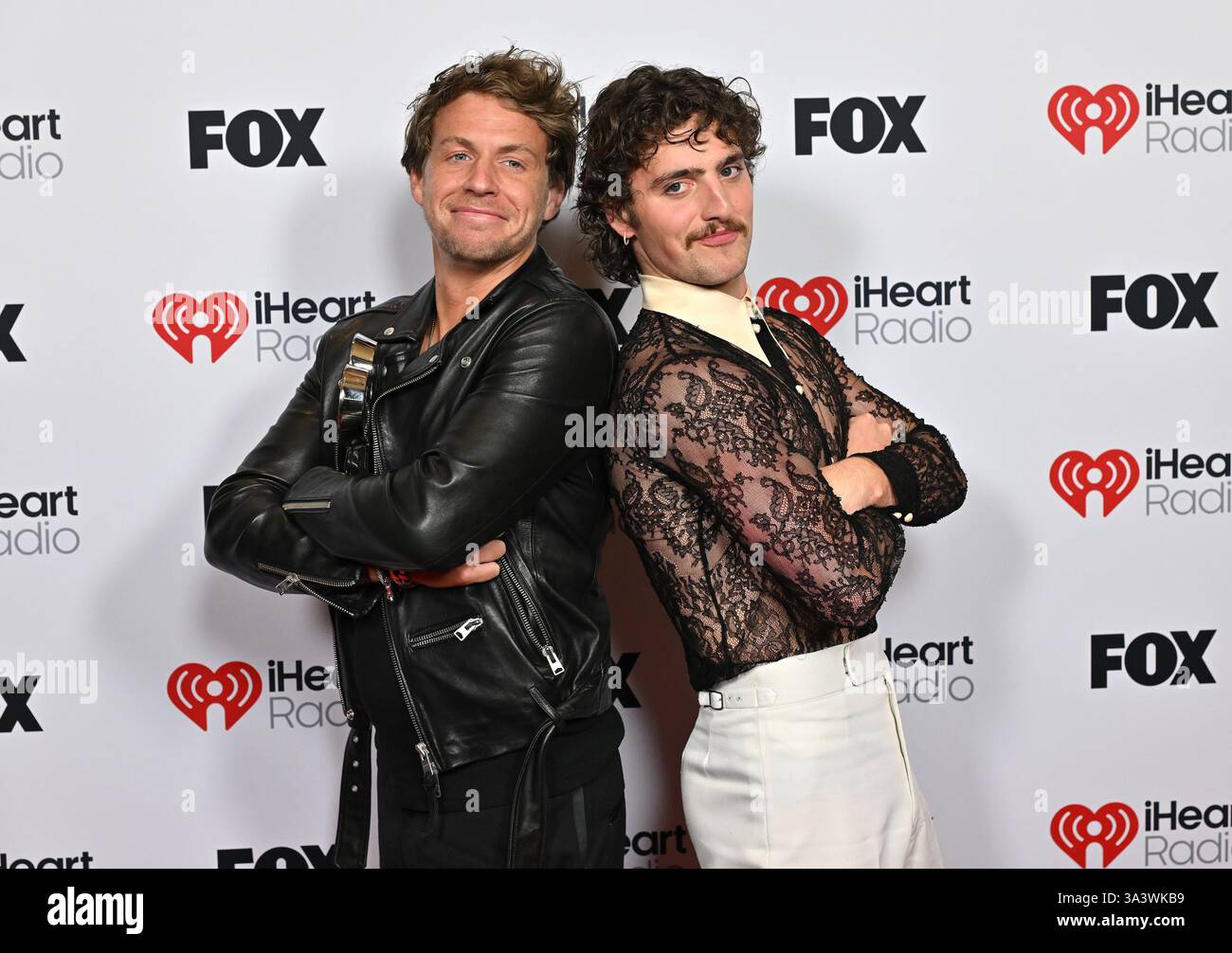 Hollywood, USA. 17th Mar, 2025. Evan Blair and Benson Boone arriving to the 2025 iHeartRadio ...