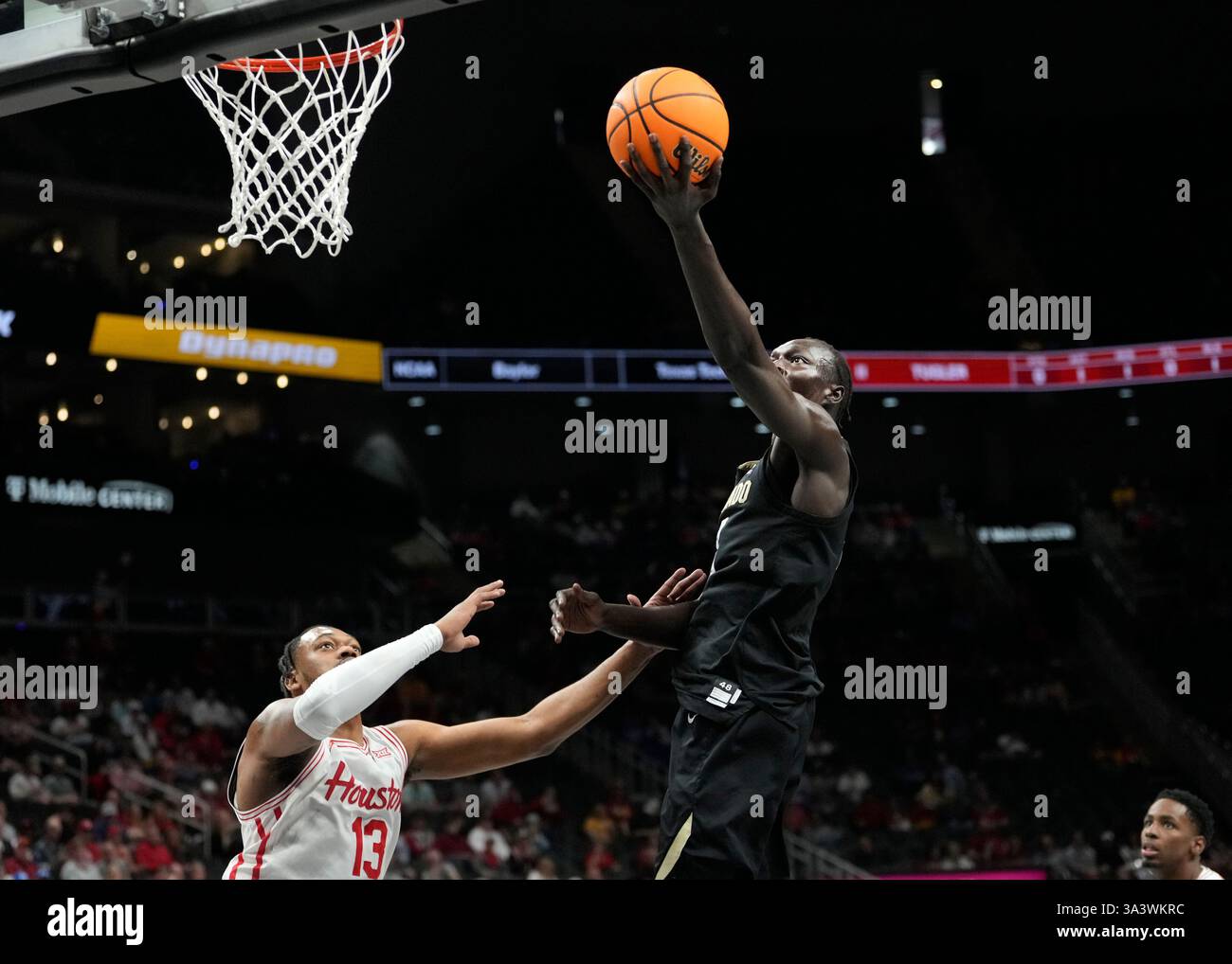 MAR 13 2025: Colorado Buffaloes forward Bangot Dak (8) shoots over ...