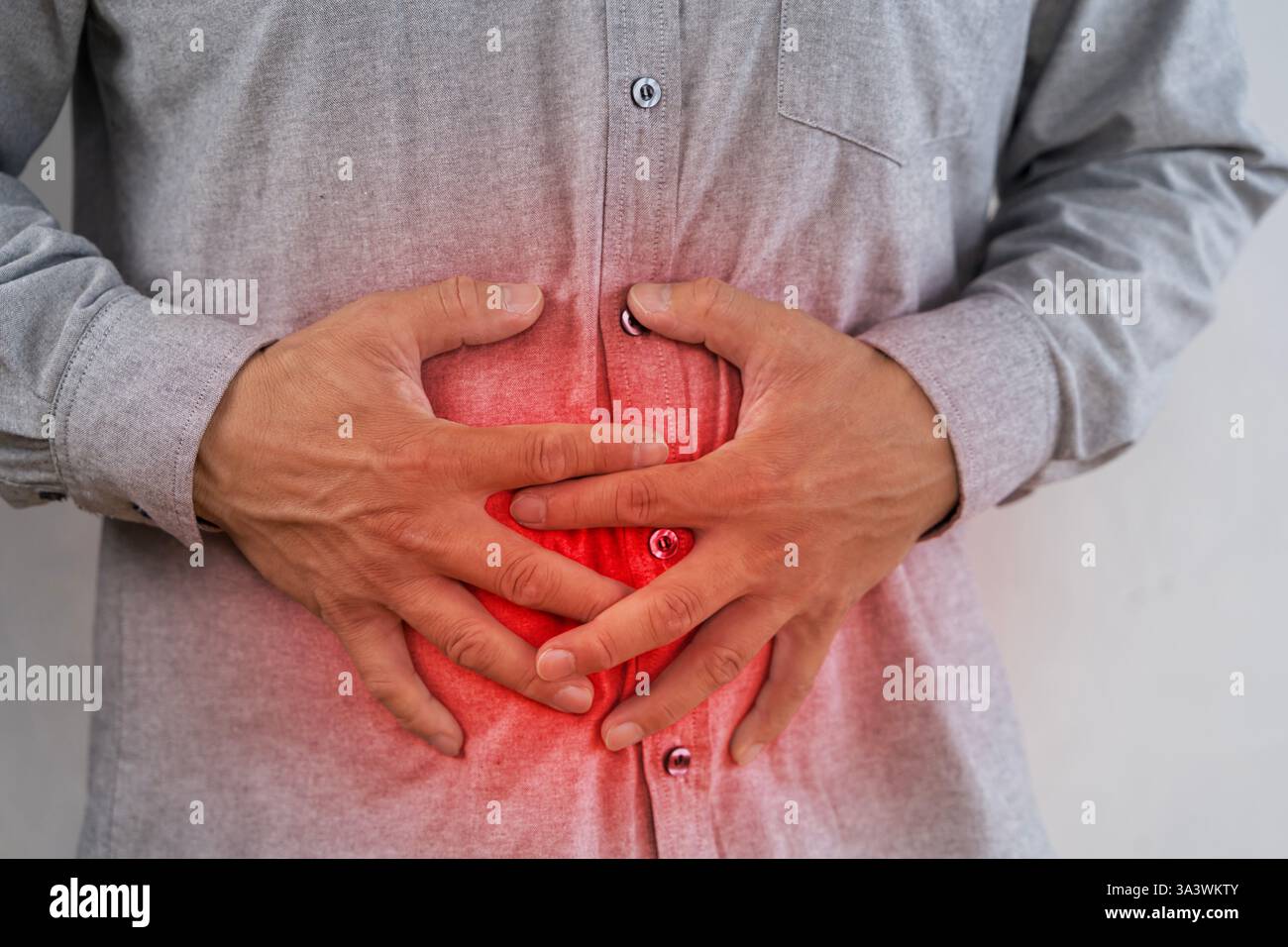 Unhealthy man suffering with stomach pain, feeling unwell Young man ...