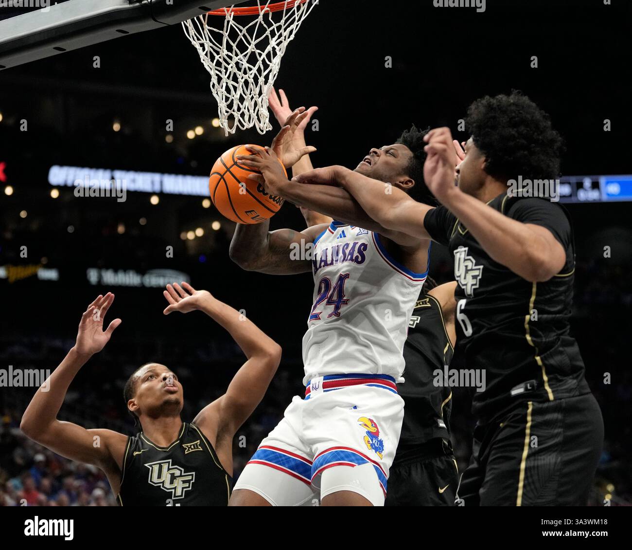 MAR 12 2025:Kansas Jayhawks forward KJ Adams Jr. (24) is fouled at the ...