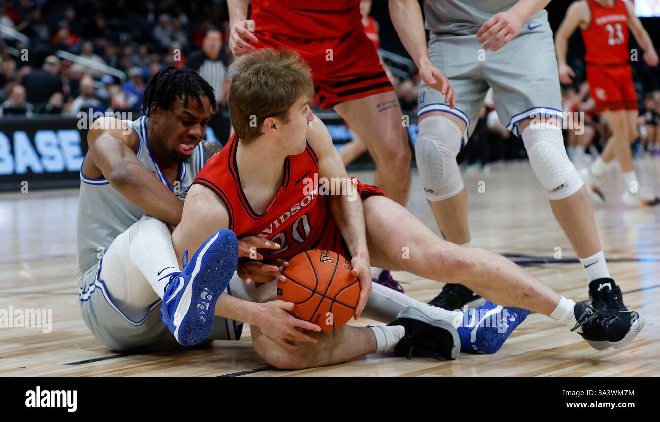 March 13, 2025: Davidson Wildcats Guard #20 Zach Laput goes to the ...