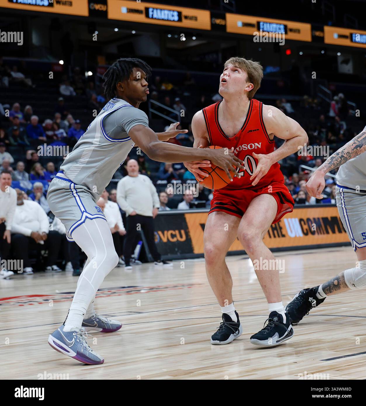 March 13, 2025: Davidson Wildcats Guard #20 Zach Laput has the ball ...