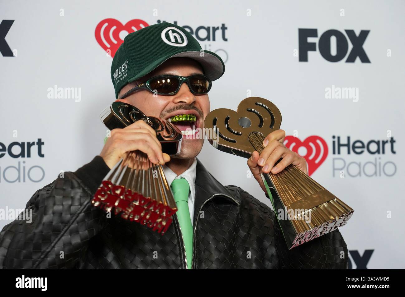 Feid arrives at the iHeartRadio Music Awards, Monday, March 17, 2025 ...