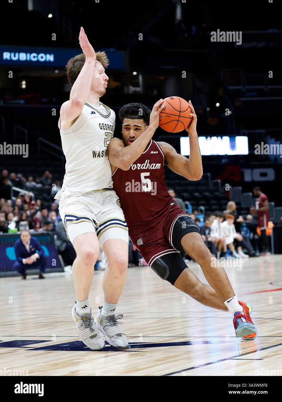 March 13, 2025: Fordham Rams Forward #5 Joshua Rivera tries to go ...