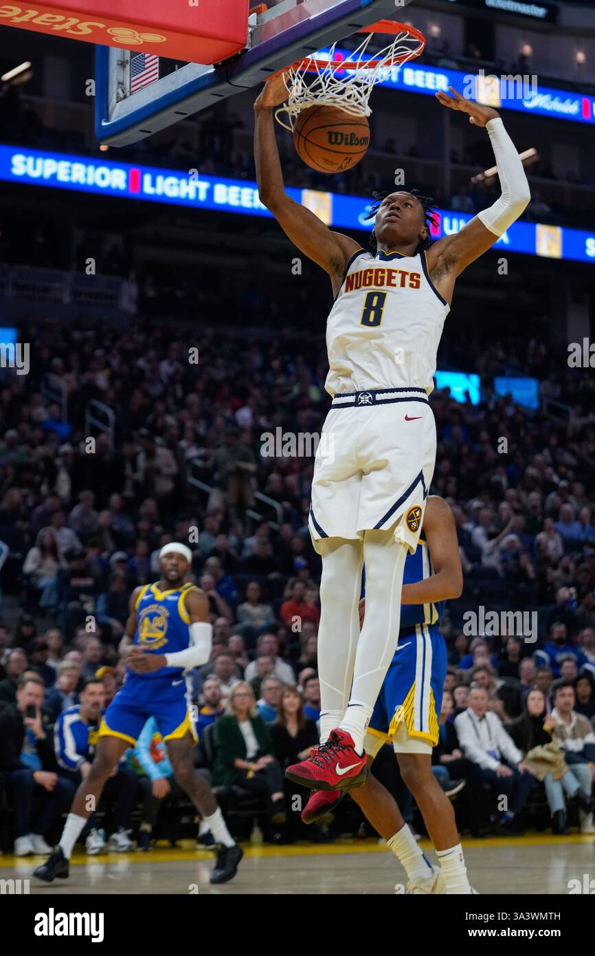 Denver Nuggets forward Peyton Watson (8) dunks during the first half of ...