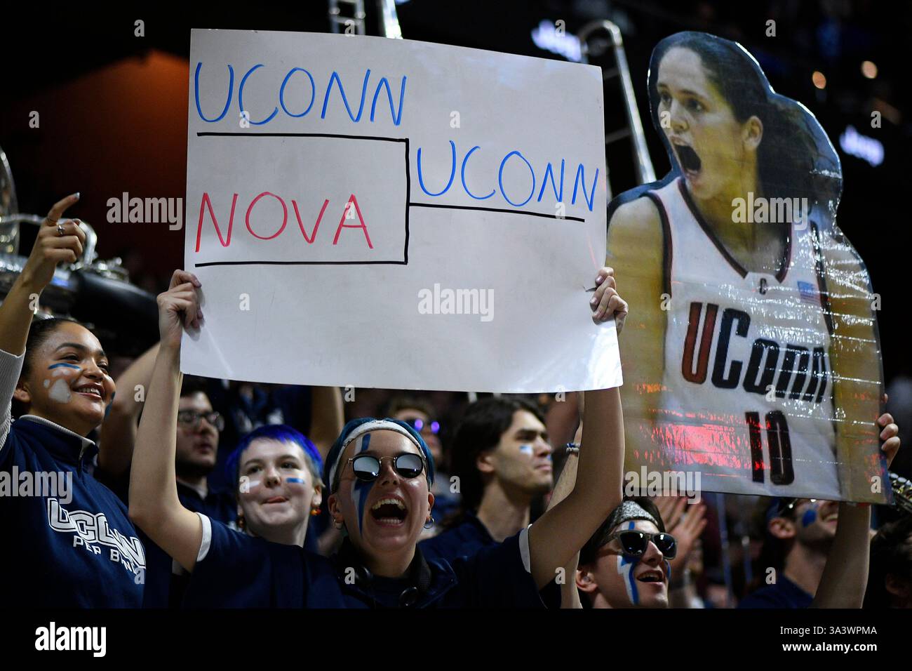 Uncasville, CT, USA. 9th Mar, 2025. The UConn Pep Band celebrates with ...