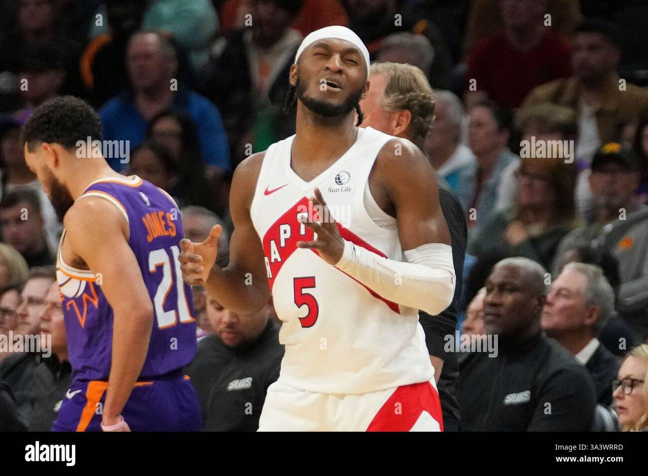 Toronto Raptors guard Immanuel Quickley (5) reacts after missing a ...
