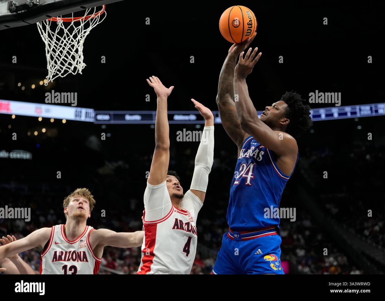 MAR 13 2025: Kansas Jayhawks forward KJ Adams Jr. (24)elevates for a ...