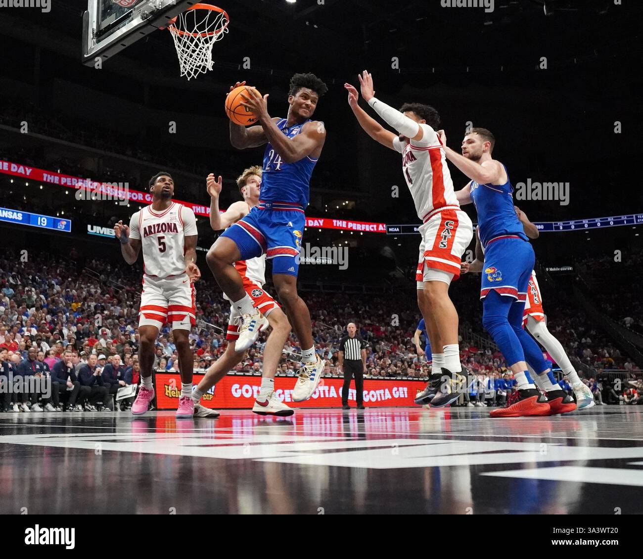 MAR 13 2025: Kansas Jayhawks forward KJ Adams Jr. (24)pulls down a ...