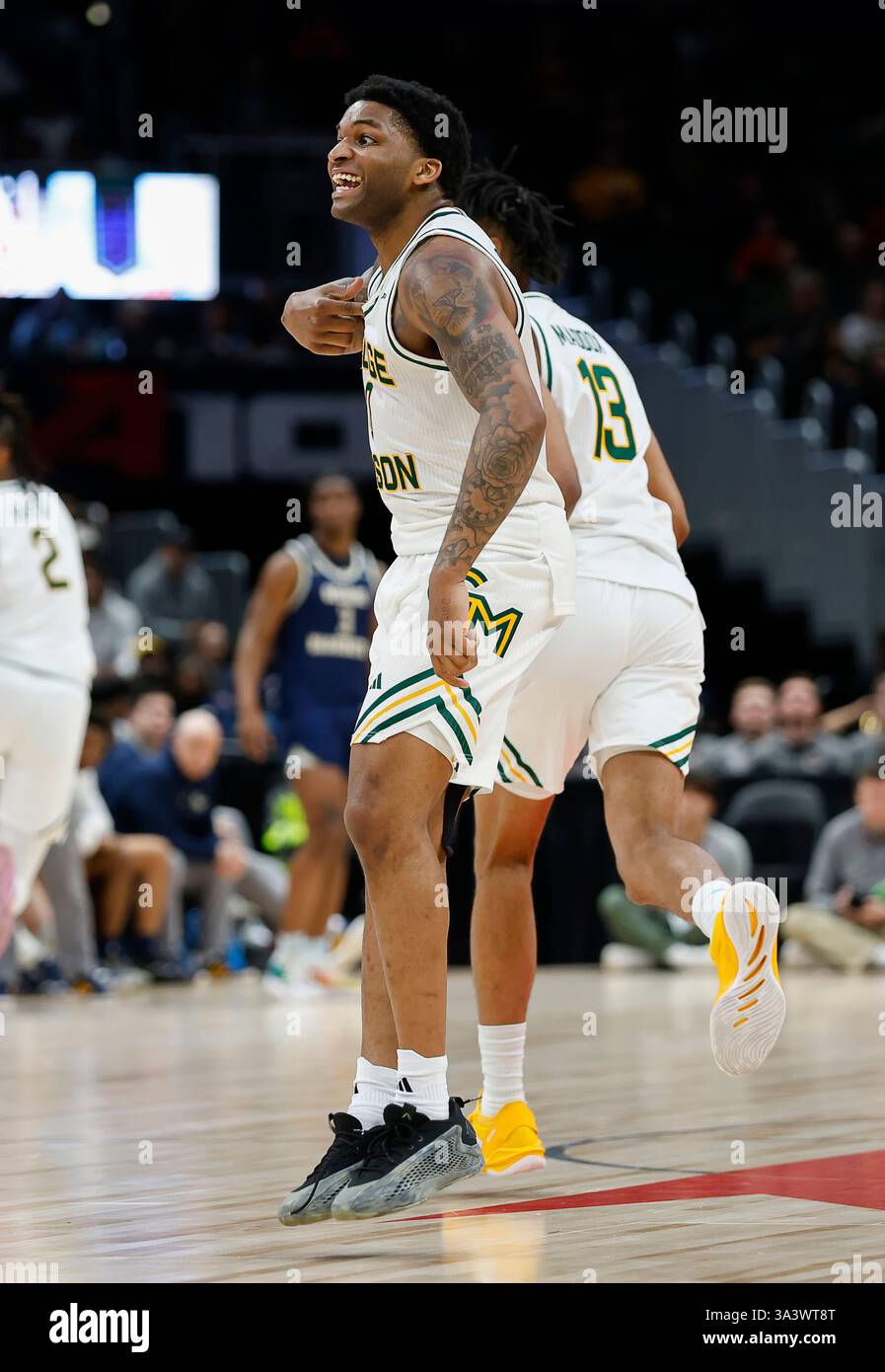 March 14, 2025: George Mason Patriots Guard (0) K.D. Johnson celebrates ...