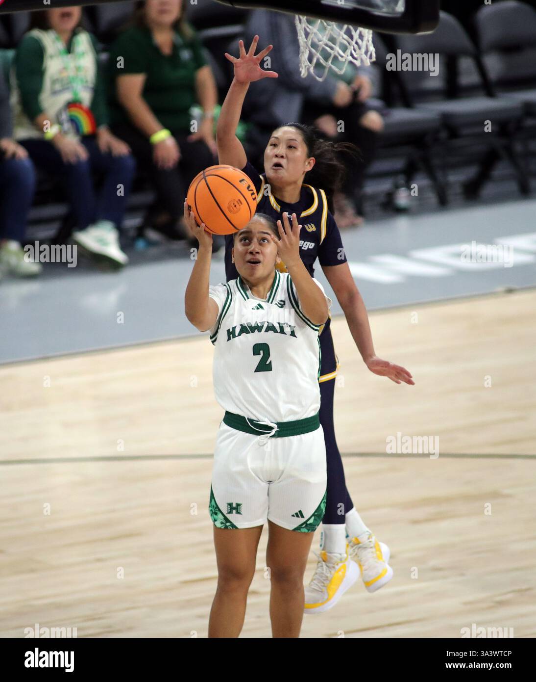 March 14, 2025 - Hawai'i Rainbow Wahine guard Mia 'Uhila #2 goes in for ...