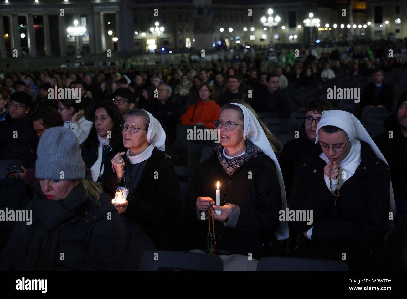 Nuns recite the rosary during the prayer of the Holy Rosary for the ...