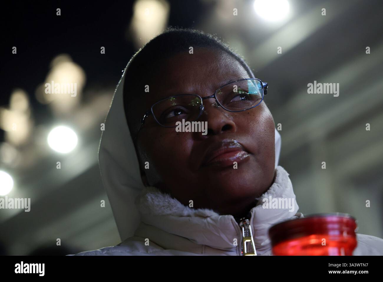 Vatican, Italy. 17th Mar, 2025. A nun recites the rosary during the ...