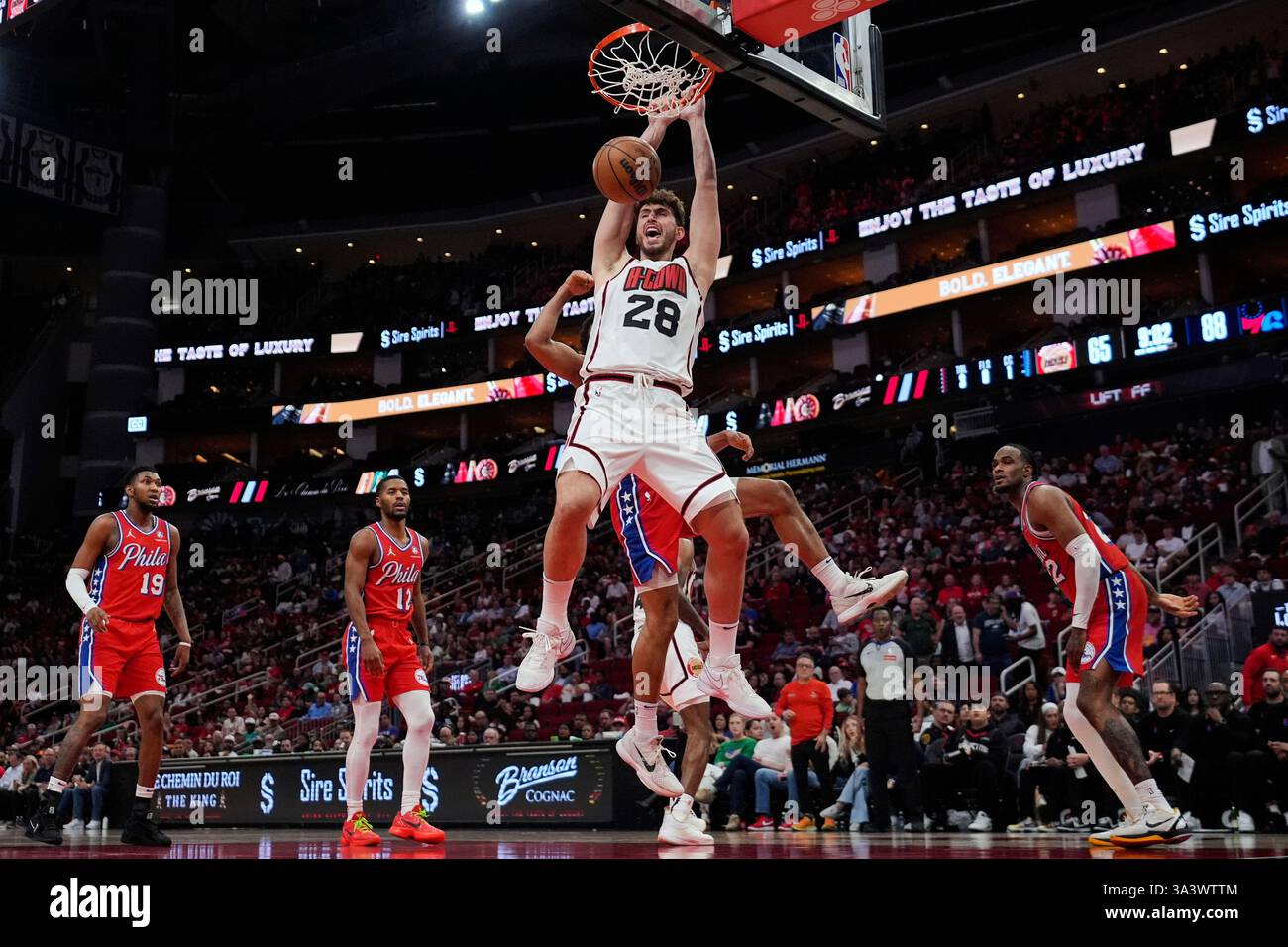Houston Rockets center Alperen Sengun (28) dunks during the second half ...