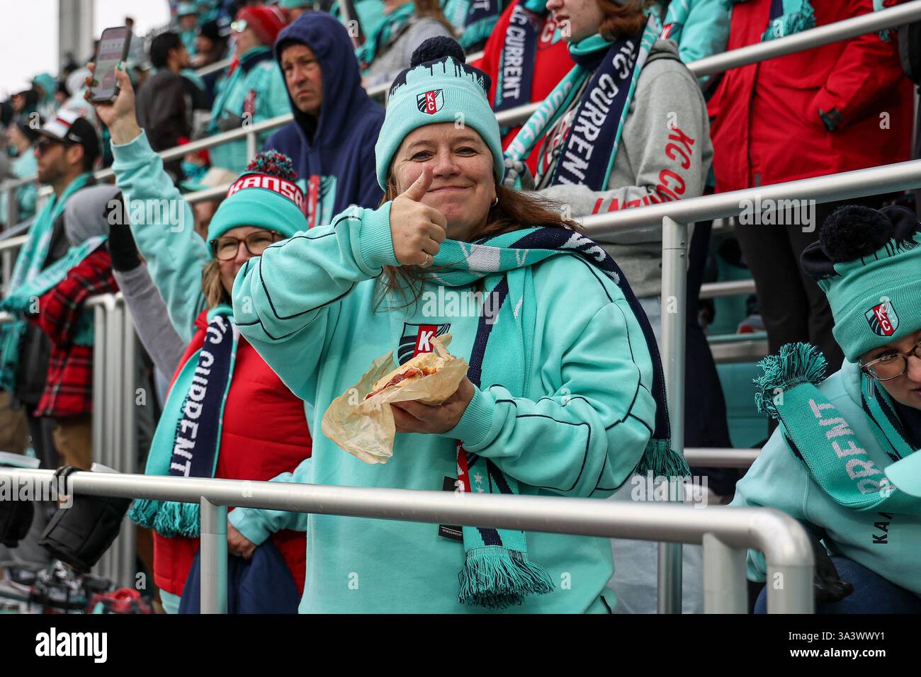 Kansas City, MO, USA. 15th Mar, 2025. A Kansas City Current fan poses ...