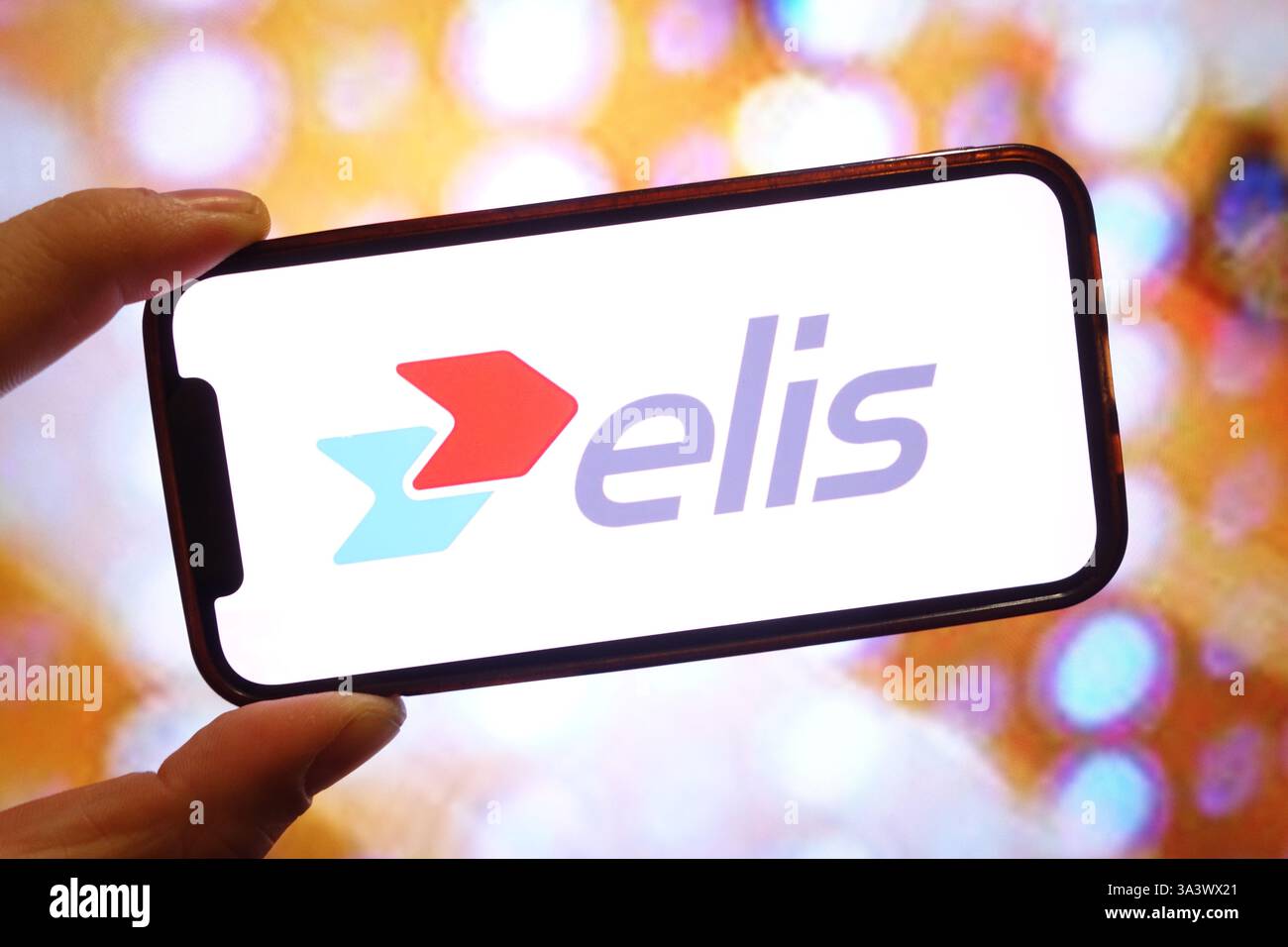 In this photo illustration, the Elis company logo is seen displayed on ...