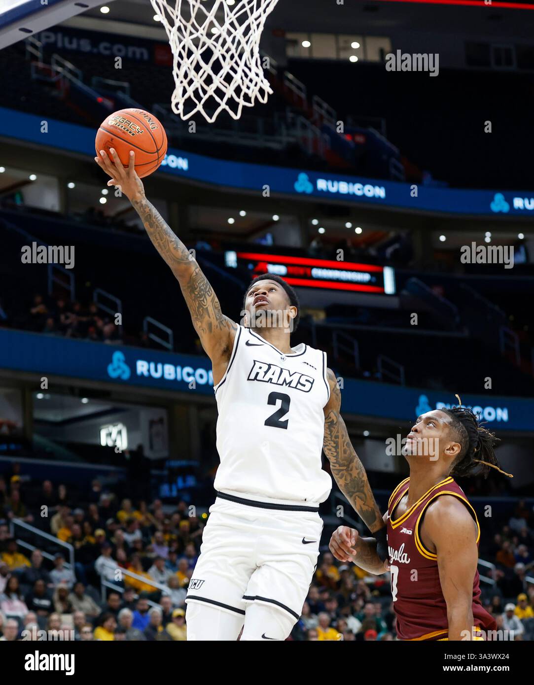 March 15, 2025: VCU Rams Guard #2 Zeb Jackson takes the ball to the ...