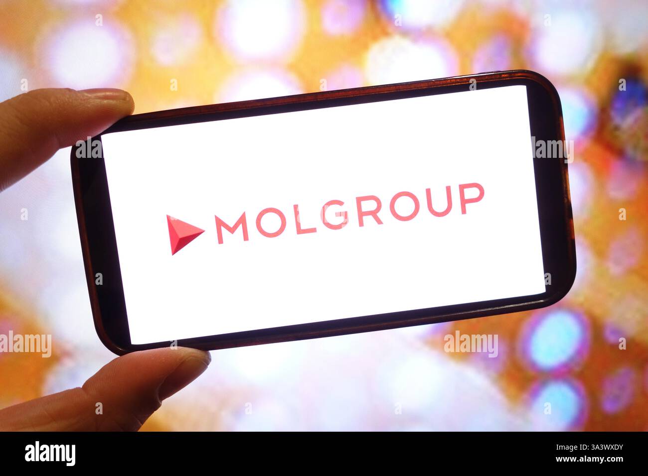 Poland. 17th Mar, 2025. In this photo illustration, the MOL Group ...