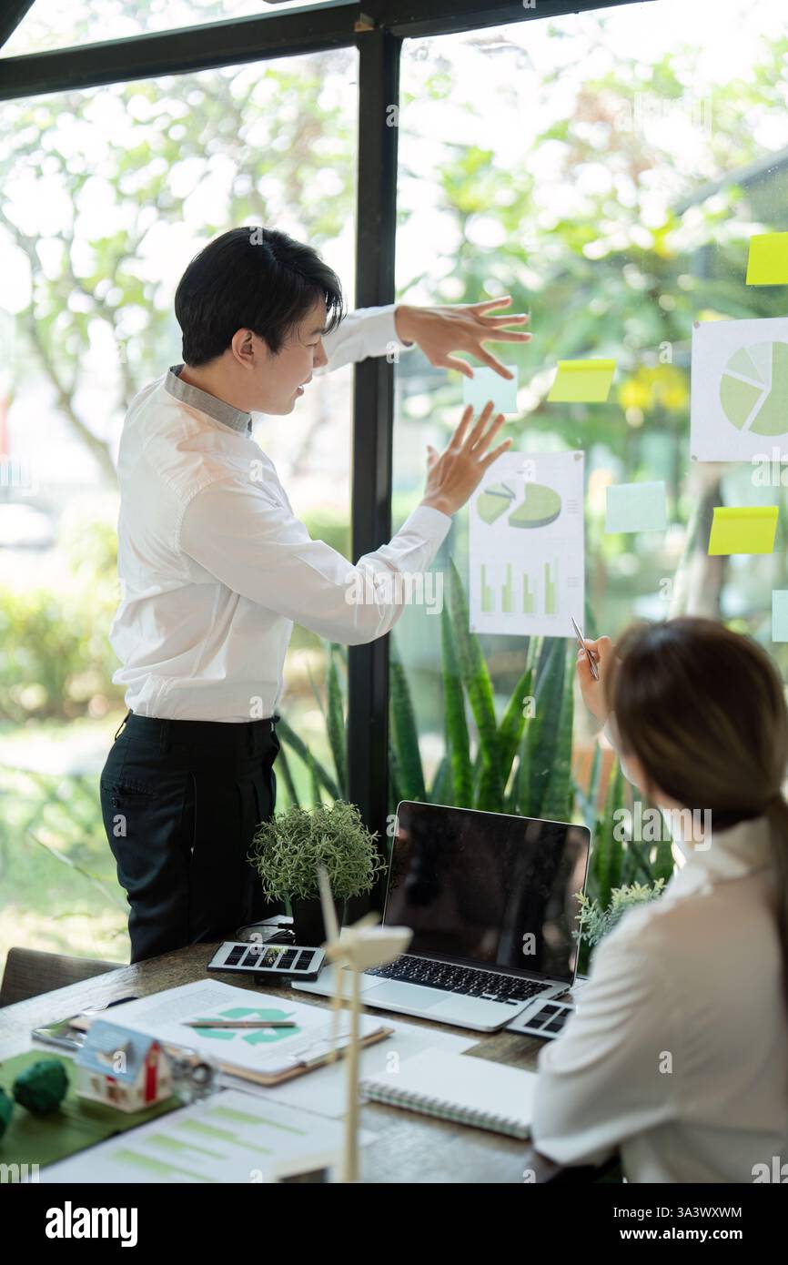 Presentation and Engagement. A professional presenting sustainable ...