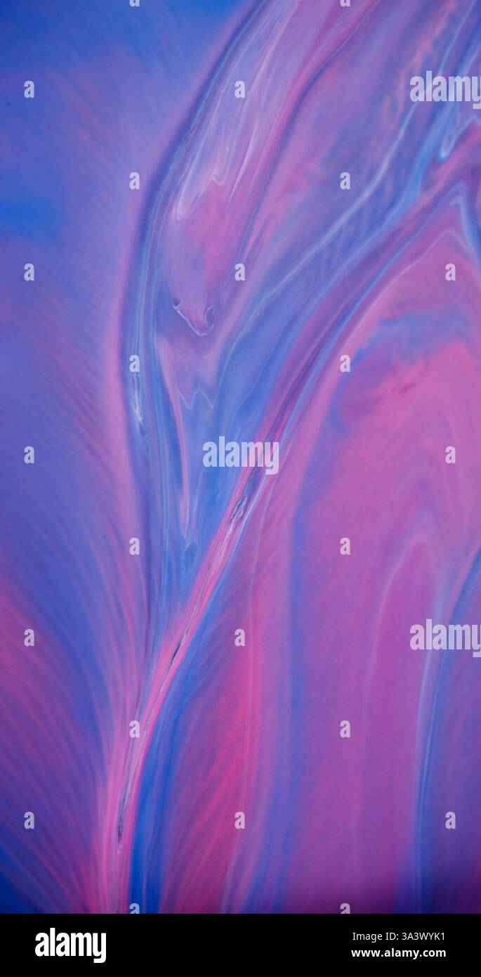 Enamel splash. Flow paint. Defocused blue pink colorful ripple mix ...