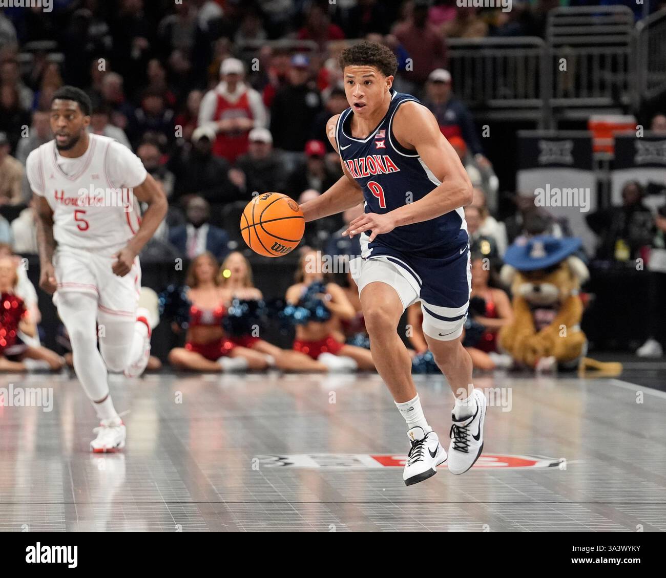 MAR 15 2025: Arizona Wildcats forward Carter Bryant (9) brings the ball ...