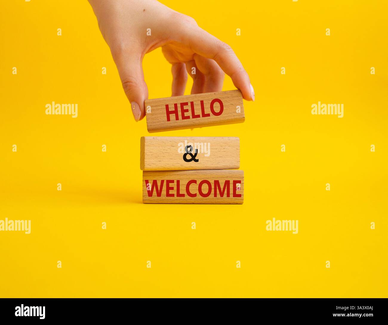Hello and Welcome symbol. Concept words Hello and Welcome on wooden ...