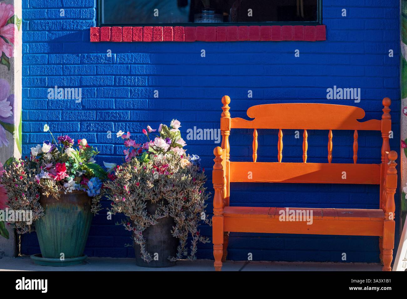 Colorful bench and blue wall in downtown Truth or Consequences, New ...