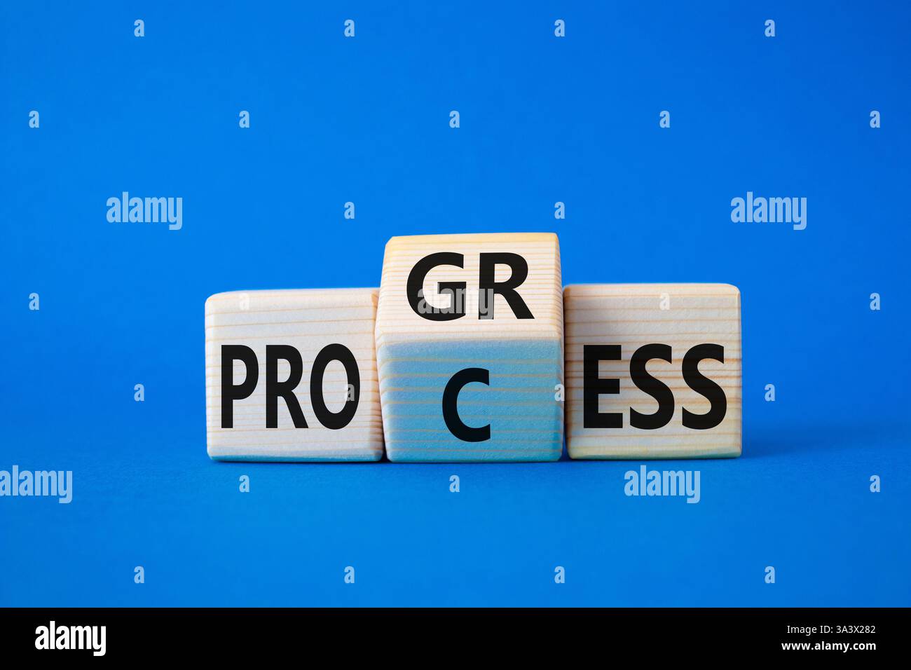 Process and Progress symbol. Wooden cubes with words Process and ...