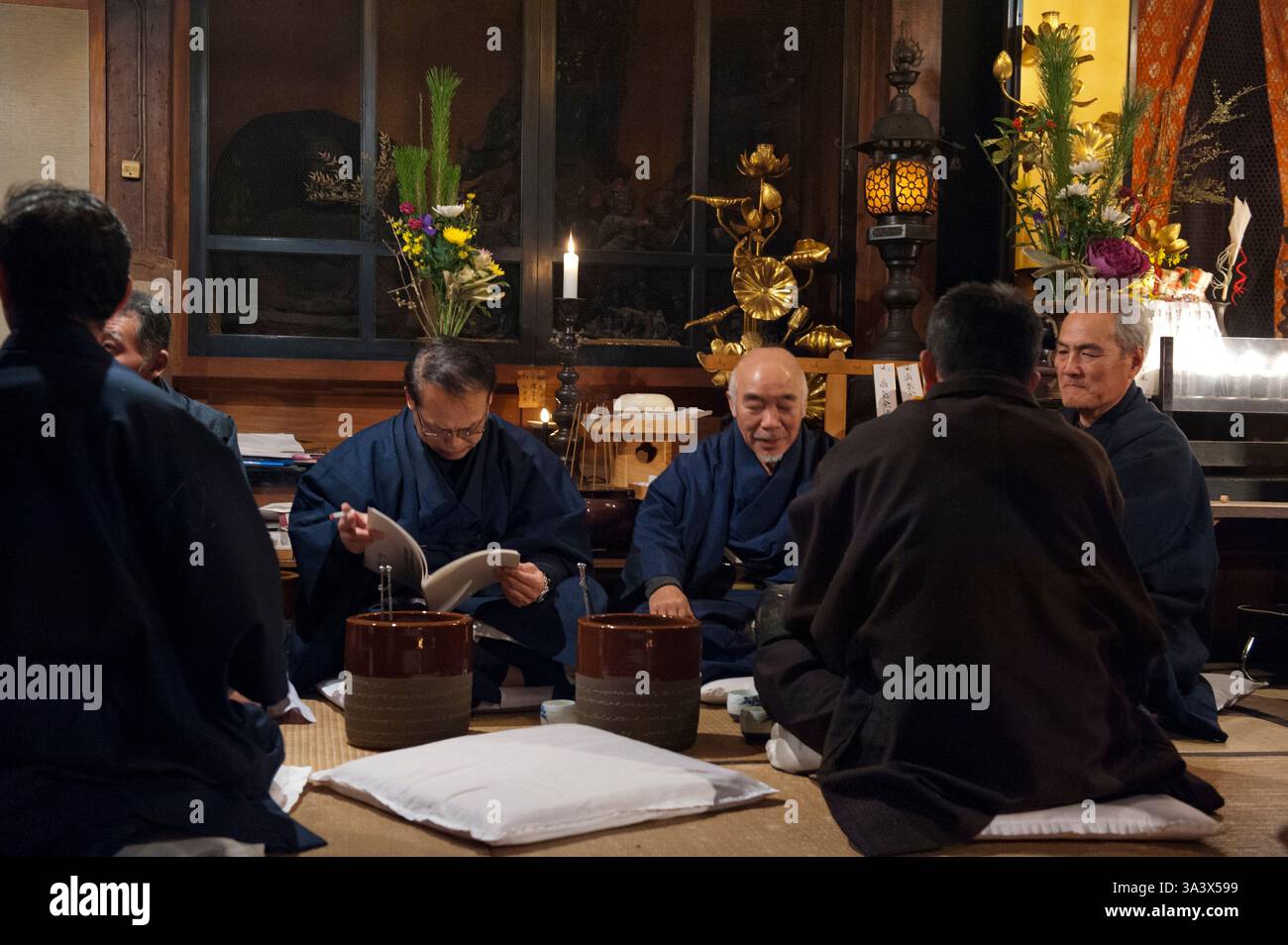 Group of community elders wearing traditional kimono sitting on the ...